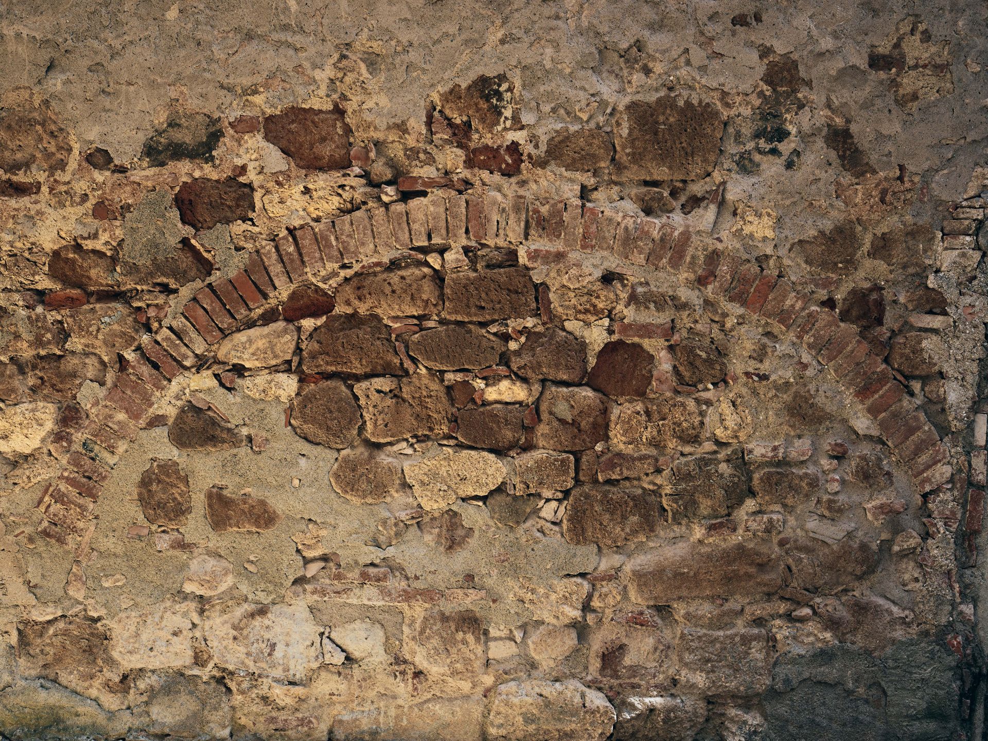 Muro antiguo con arco PapelPintado.com